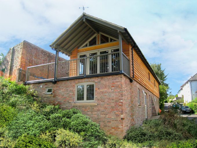 Repurposed Farm Building to Riverside Home | Western Design Architects