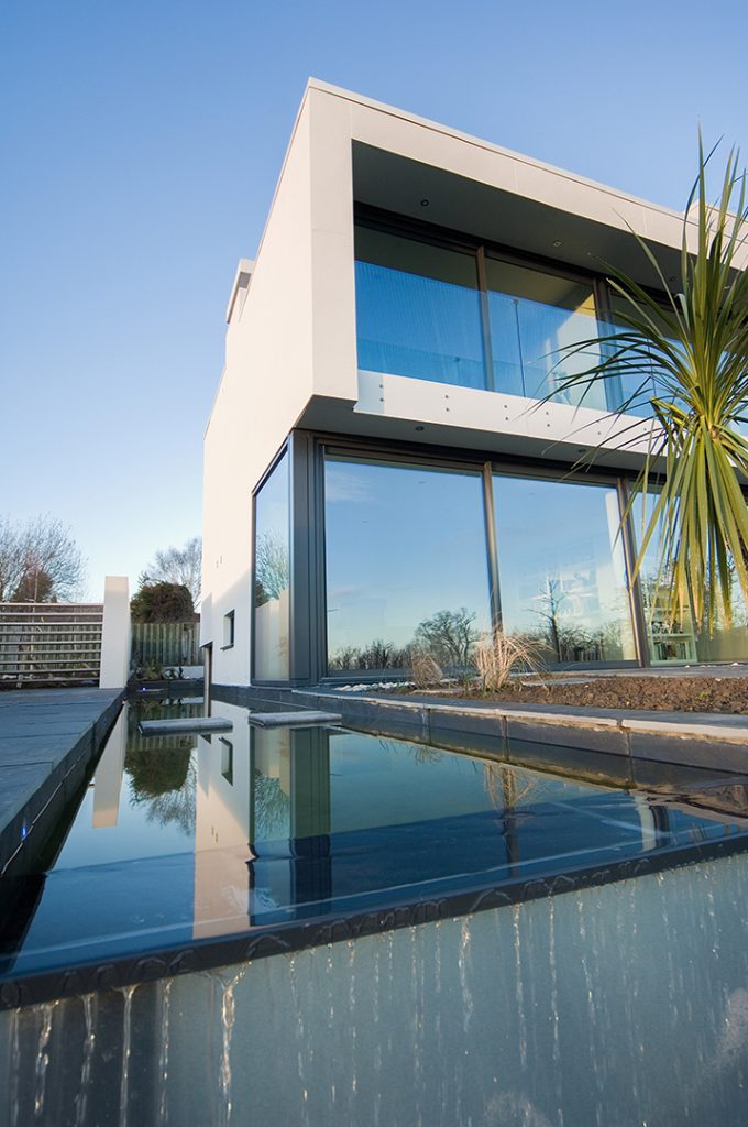 Simple Mordern Home with Moat | Western Design Architects